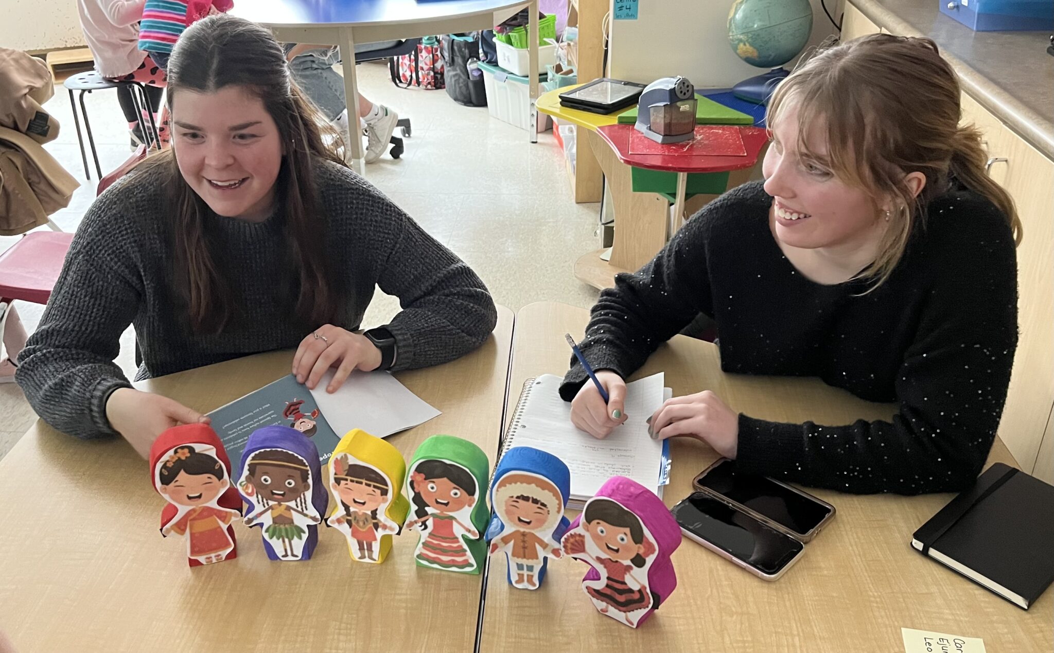 Interior design students test educational toys with grade one class ...